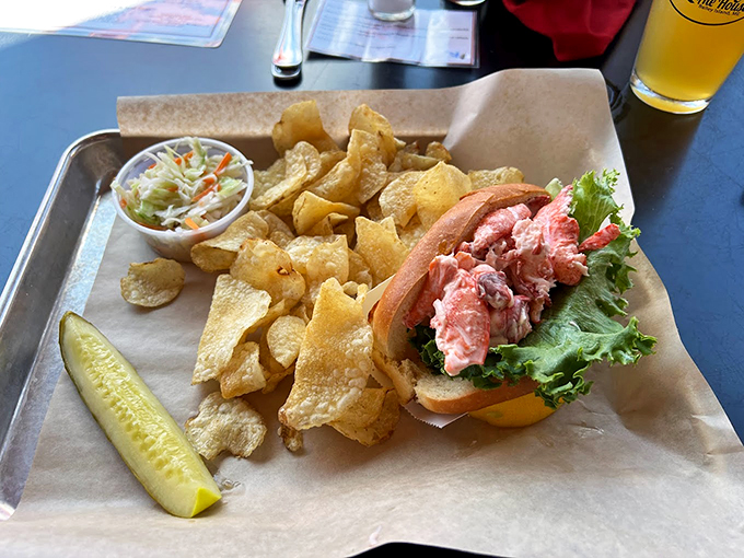 Simple perfection: fresh lobster, crisp lettuce, buttery roll, and house-made chips. Sometimes the classics just can't be improved.