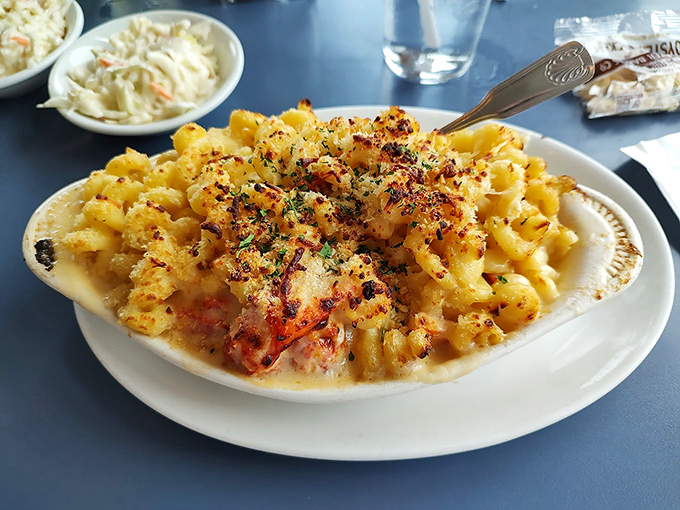 Mac and cheese gets the coastal treatment with succulent lobster meat and a golden crown of perfectly broiled breadcrumbs.