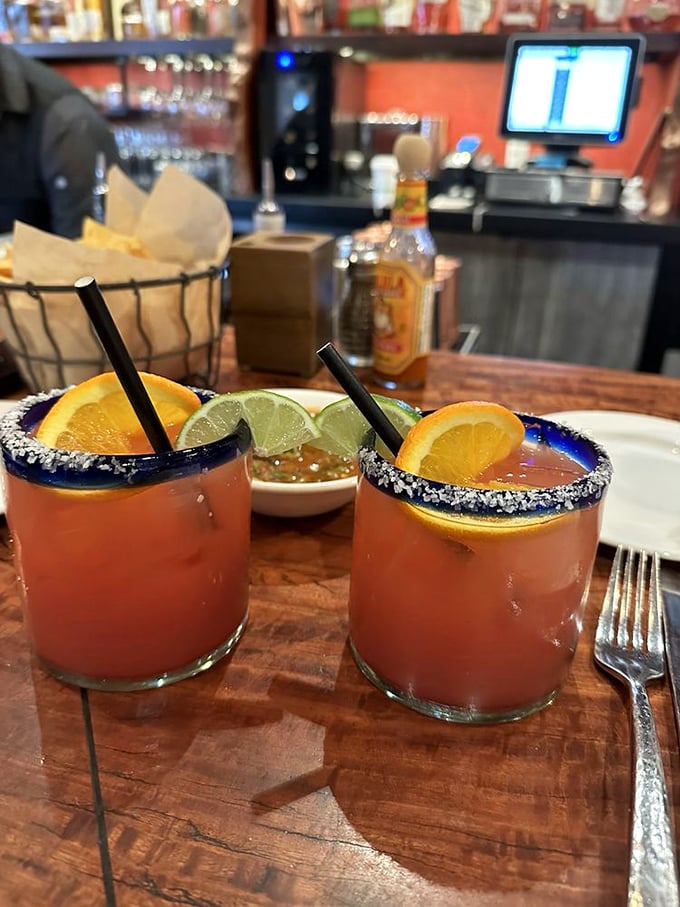 Margaritas that could make a cactus pucker! Rimmed with salt and topped with citrus, they're like sunshine in a glass.