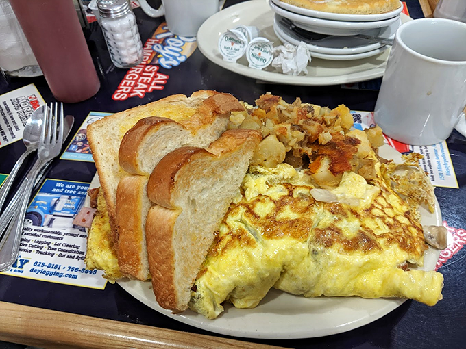Fluffy, golden, and generous - this breakfast beauty comes with enough toast to soak up every delicious bite.