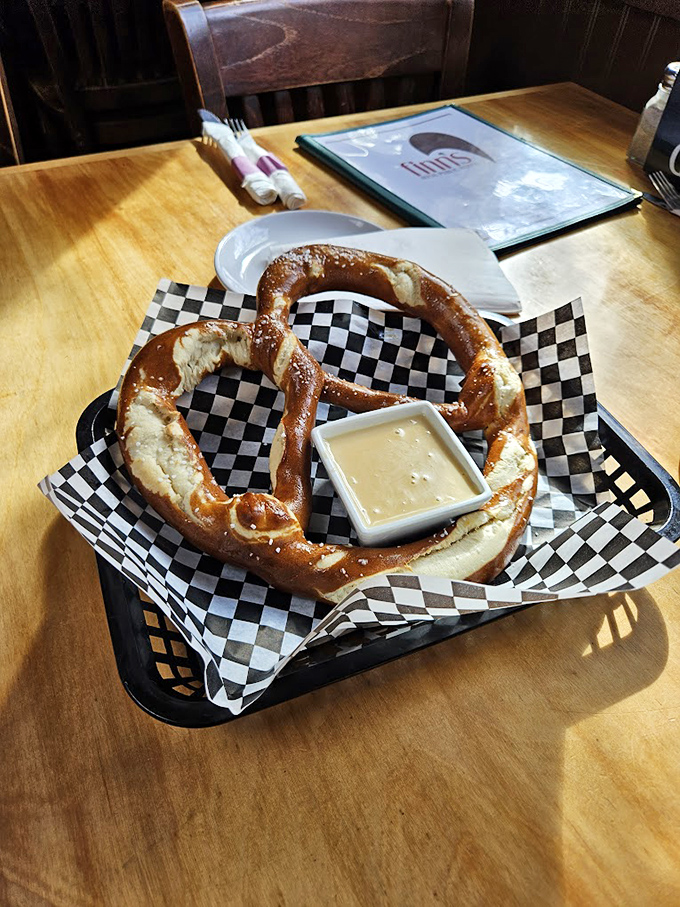This jumbo pretzel isn't messing around &ndash; golden-brown, perfectly salted, and ready for its warm beer cheese bath.