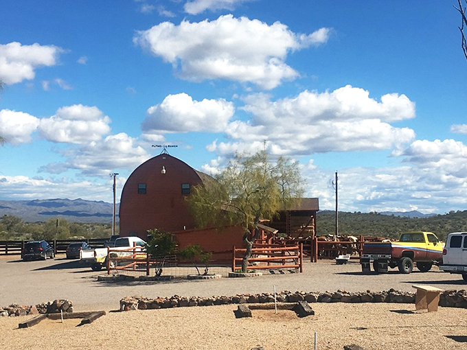 Home on the range, indeed! This ranch looks like it jumped right off a postcard, complete with a barn that's redder than a cowboy's sunburn.