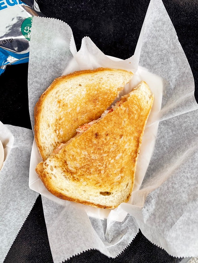 The grilled cheese sandwich that proves sometimes the simplest pleasures are the most satisfying, especially with those golden-crisp edges. Photo credit: Daniel Chung