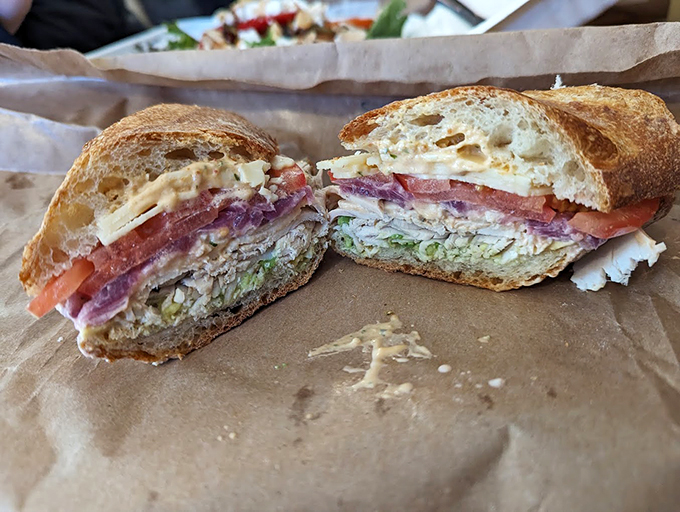 This isn't just a sandwich - it's architecture in lunch form, built with layers of fresh ingredients and house-baked bread. Photo credit: Turtle jones