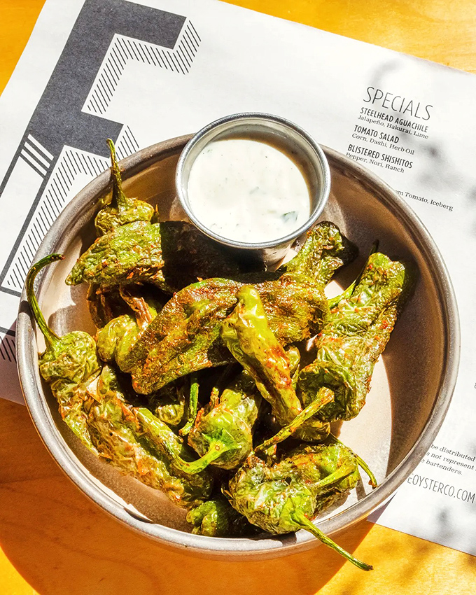 Blistered shishito peppers play culinary roulette – most are mild, but occasionally one brings the heat.