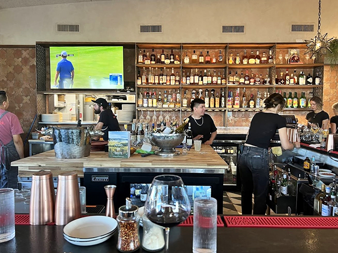 Behind the bar, mixologists craft cocktails while chefs work their magic. It's dinner and a show, Phoenix style.