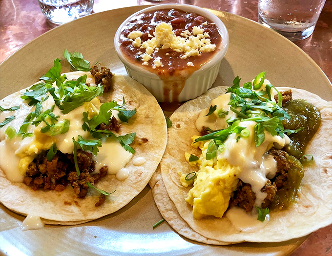 Breakfast tacos that prove morning meetings can be a pleasure, especially when they're stuffed with eggs and topped with fresh cilantro. Photo credit: Gregory Merchel