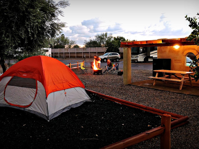Camping goes glam! This setup proves you can have your s'mores and eat them too, all while enjoying the comforts of home. Photo credit: Tucson / Lazydays KOA Resort