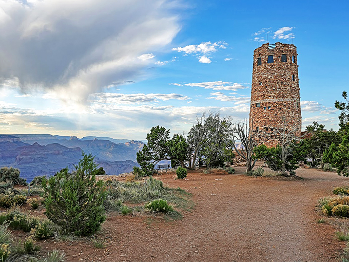 Nature's own bonsai garden: Gnarled trees frame the tower, their resilience a testament to life on the edge &ndash; literally.