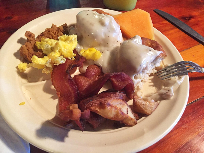 Biscuits so fluffy they defy gravity, swimming in a sea of creamy gravy. It's breakfast nirvana, Southern style!