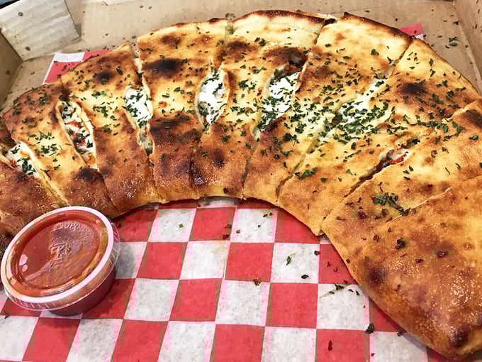 Calzone or edible pillow? This herb-speckled wonder looks so comforting, you might be tempted to take a nap on it. Resist and eat instead!