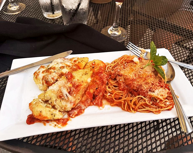 The holy trinity of Italian-American cuisine: chicken, cheese, and enough marinara to swim in. This chicken parm is what comfort food dreams are made of.