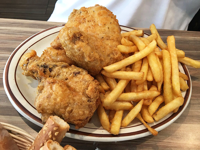 Golden-brown chicken and perfectly crispy fries - a dynamic duo that proves sometimes the simplest combinations are the most satisfying.