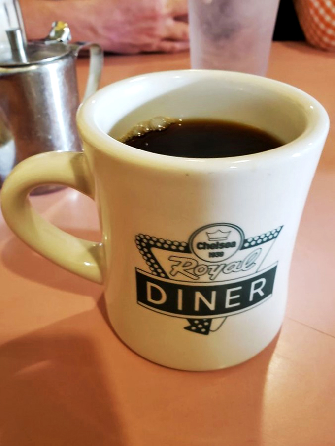 The elixir of life, served in a mug that's seen more stories than a library. This coffee is your ticket to a day full of possibilities.