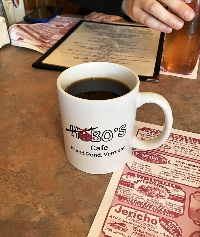 Coffee: because adulting is hard, but Hobo's makes it easier. This mug of liquid motivation comes with a side of small-town charm.