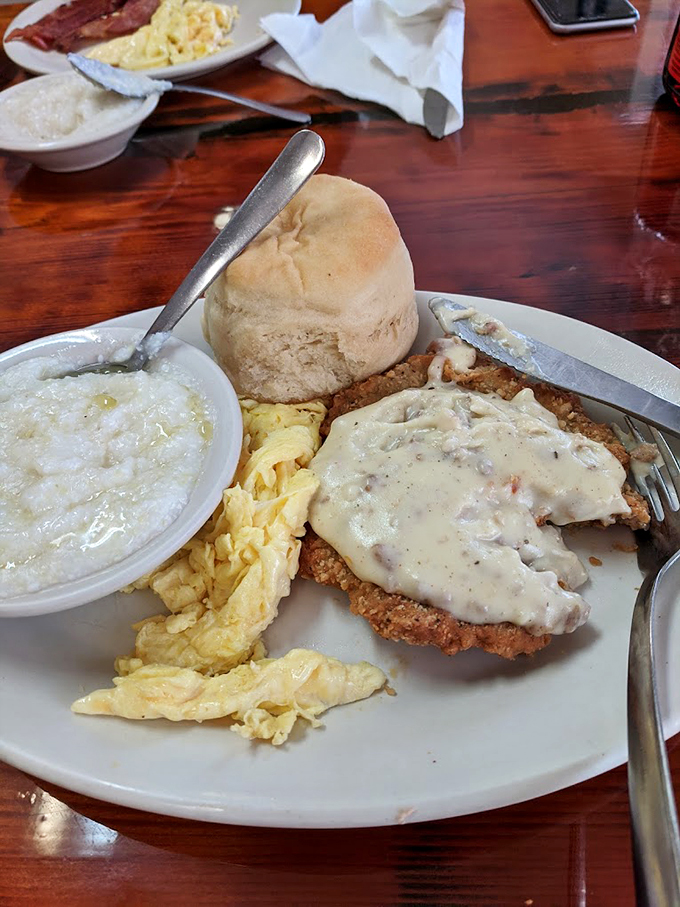 Country fried steak: where comfort food meets cardiac event. This crispy, gravy-smothered masterpiece is worth every extra minute on the treadmill.