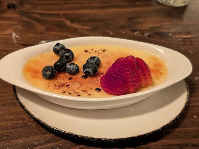 Crack into heaven! This silky cr&egrave;me br&ucirc;l&eacute;e, adorned with fresh berries, is the perfect blend of smooth and crunchy textures. 