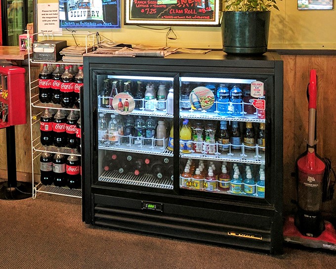 Thirst quenchers galore! This fridge is stocked like a liquid rainbow, ready to wash down your feast in style.
