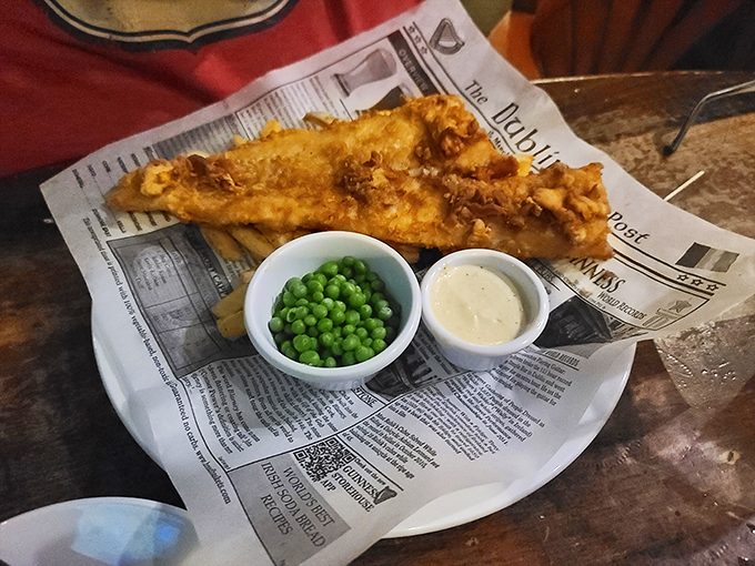 Fish so crispy, it could audition for a potato chip commercial. Paired with those golden fries, it's a match made in comfort food heaven. Photo credit: Cameron Lennox