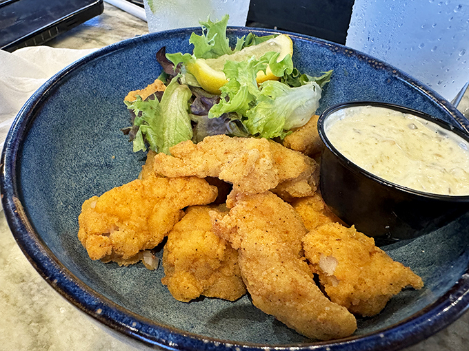 Crispy, golden, and utterly irresistible. This fish fry is so good, it might just have you speaking in scales... I mean, superlatives! Photo credit: Trey Butler