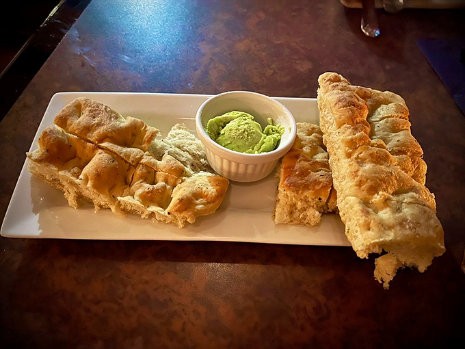 Bread that demands attention! This focaccia with its vibrant dip is the opening act that threatens to steal the whole show. Photo credit: Bob N.