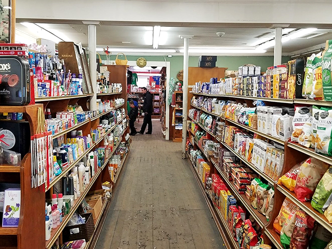 Grocery shopping or scavenger hunt? This aisle is packed tighter than a summer tourist's suitcase, with goodies from floor to ceiling.