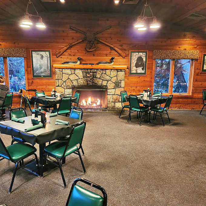 Step into a world where Paul Bunyan meets fine dining. With its roaring fireplace and rustic decor, this dining room feels like a warm, delicious hug for your taste buds.