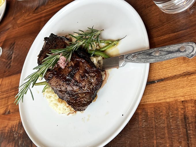 This steak's so perfectly cooked, it could make a vegetarian weep. Juicy, tender, and ready for its close-up! Photo credit: Mailyn C