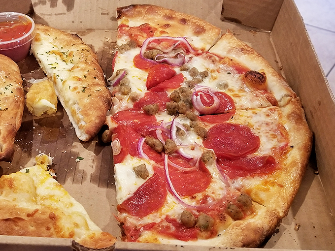 Pizza perfection meets breadstick brilliance. It's like the Avengers of Italian cuisine assembled on one plate.