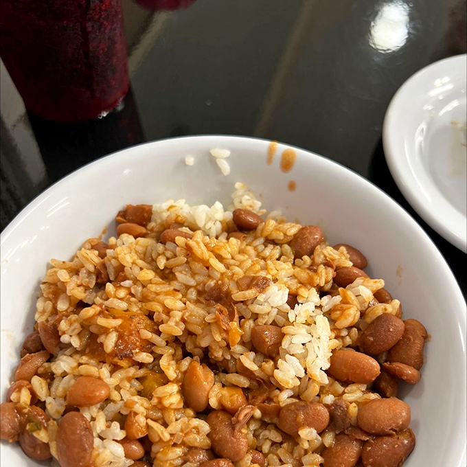 Rice and beans: The dynamic duo of comfort food. This hearty bowl is like a warm hug for your taste buds. Photo credit: Eileen R.