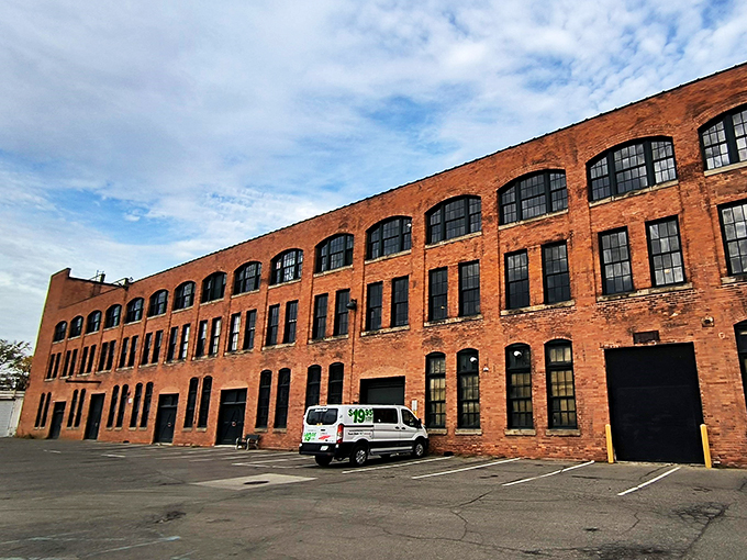 A brick behemoth with a story to tell. If these walls could talk, they'd probably sound like the purr of a well-tuned engine.