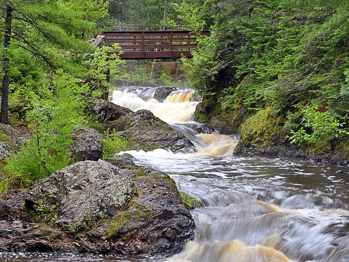Multiple cascades create nature's own staircase, with each step telling a story of ancient geology.