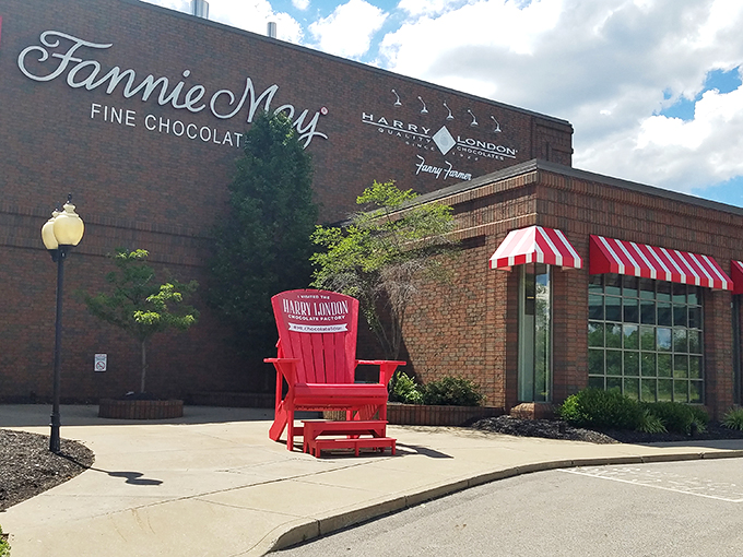 That red chair isn't just for sitting, it's a throne for chocolate royalty. At Harry London's, every customer is king (or queen)! 