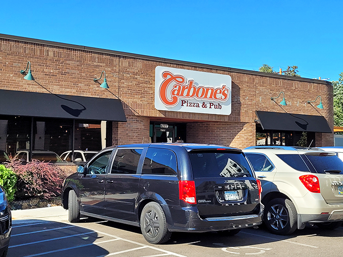 Carbone's: Keeping it simple and delicious since way back when. Sometimes, all you need is a great sign and even better pizza.