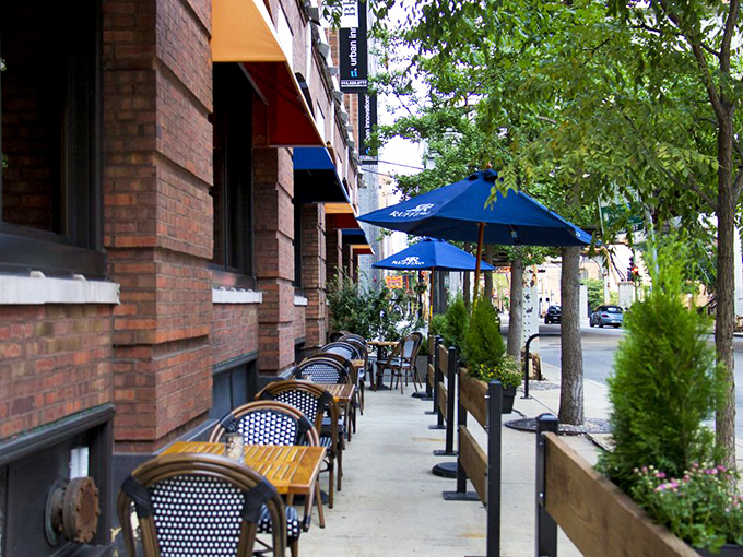 Blue awnings and sidewalk seating invite you to pause and ponder life's big questions &ndash; like "How soon is too soon for seconds?"