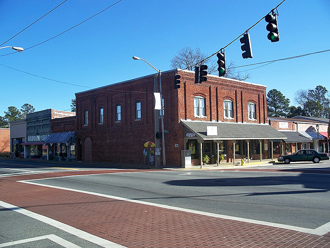 Classic brick buildings line the main street like a perfectly preserved slice of small-town Americana, complete with vintage charm.