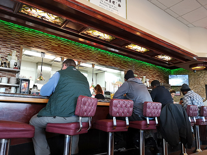 Red leather seats and a bustling counter? Louie's is like stepping into a time machine set to 'delicious'.