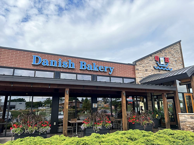 Forget the bat signal, this "Danish Bakery" sign is the real call to action for pastry lovers everywhere.