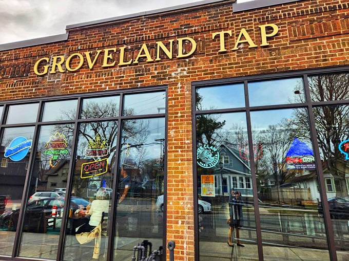 Where beer signs outnumber windows. The Groveland Tap's facade is a colorful collage of neon, promising liquid gold within. Photo credit: Jennifer A.