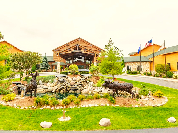 Life-sized moose and bear statues guard this landscape, adding whimsy to the wilderness-themed fun.