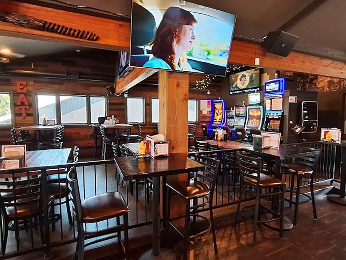 Where rustic charm meets modern comfort. This dining area feels like your coolest friend's cabin - if that cabin had top-notch food and drinks.
