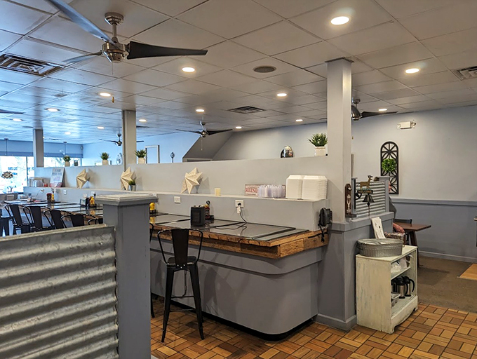 Rustic charm meets modern flair. Is that a wagon wheel on the wall? Yee-haw meets yum-yum in this cozy corner of culinary delight.