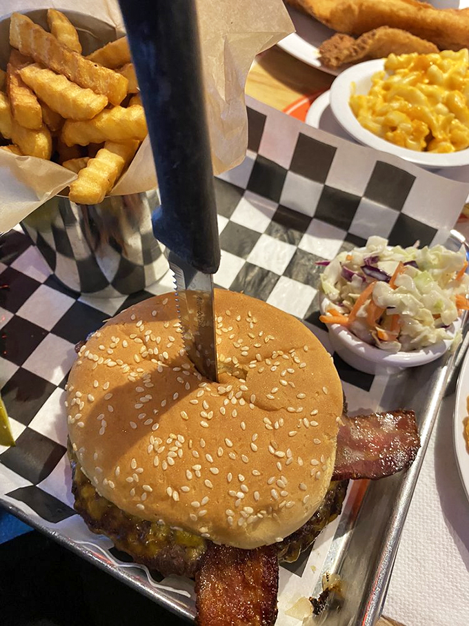 The "Monster" burger lives up to its name! It's a towering testament to the art of excess &ndash; in the best way possible.