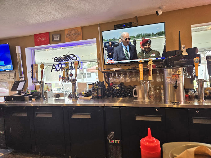 The well-stocked bar offers everything from cold drafts to creative cocktails, perfect for washing down those hearty portions.