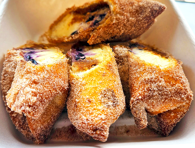 Sweet meets heat in these blueberry poppers, dusted with powdered sugar and bursting with Maine's favorite fruit.