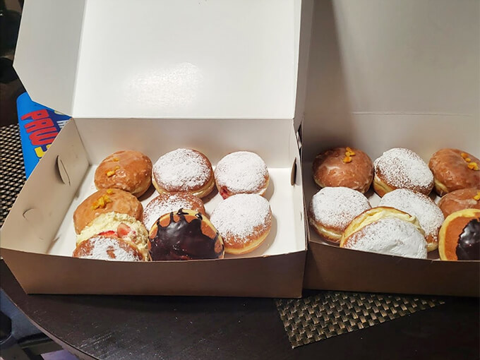 These aren't just donuts - they're little round ambassadors of joy, dusted with powdered sugar and filled with happiness.