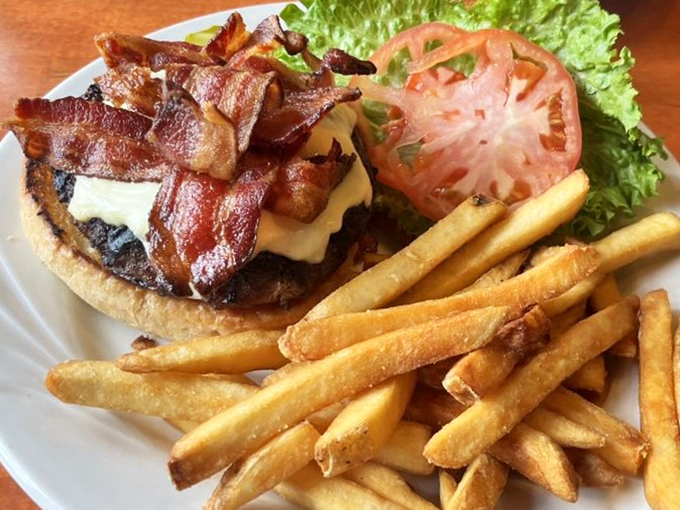 A burger that means business, topped with bacon that's clearly graduated from the school of perfect crispiness.