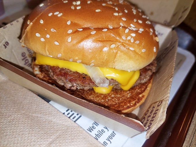 The classic cheeseburger, with its perfectly melted American cheese, proves some things are timeless for a reason. Photo credit: Jamie Creamer