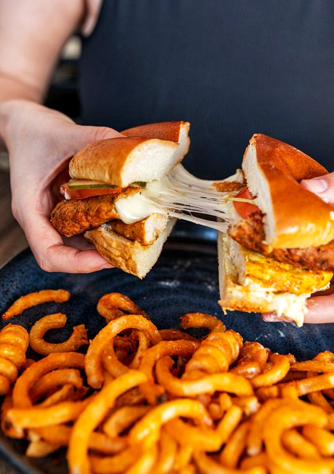 That cheese pull moment when your chicken sandwich decides to put on a show worthy of Vegas.