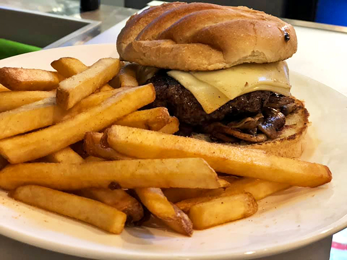 Sometimes simple is best - a perfectly grilled burger with melted cheese that reminds you why classics become classics.